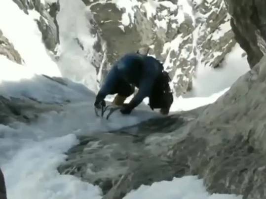 Climber clips in right before the ice sheet he's on breaks | Scrolller