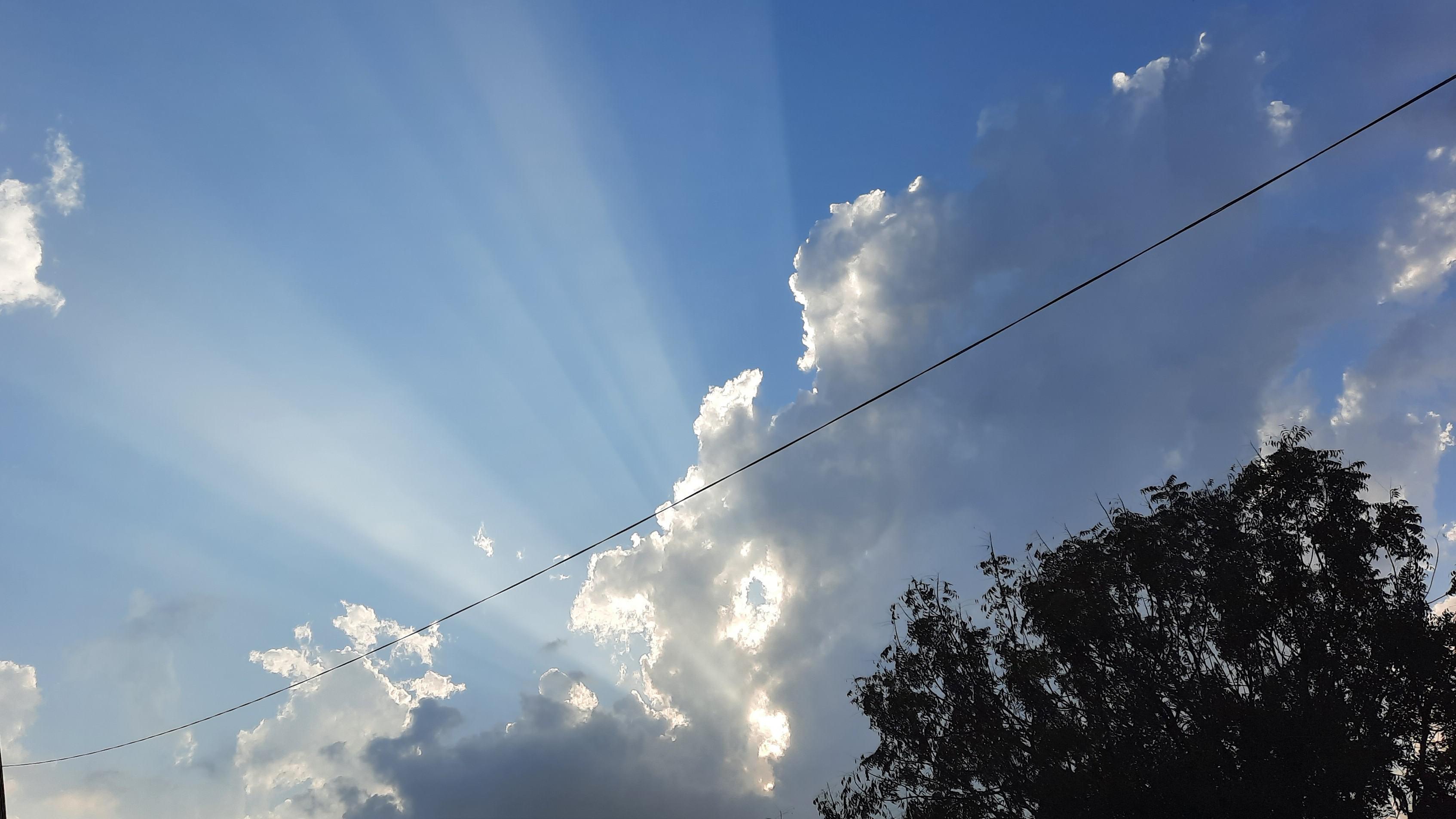 Clouds cover up the sun while it's setting down in Tamil Nadu, India | Scrolller