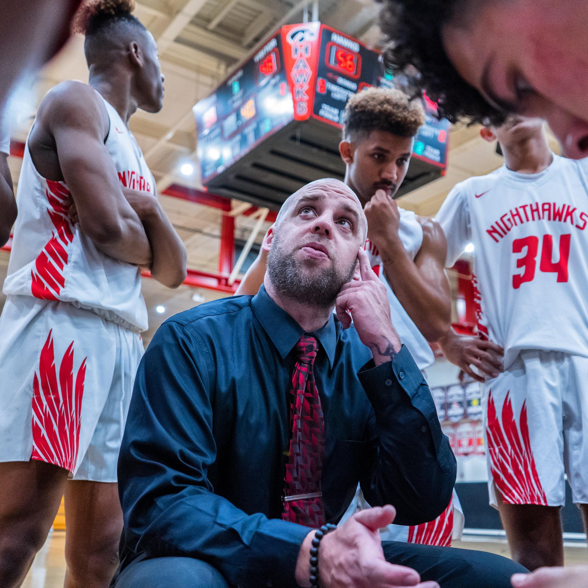 Coach giving a lesson | Scrolller