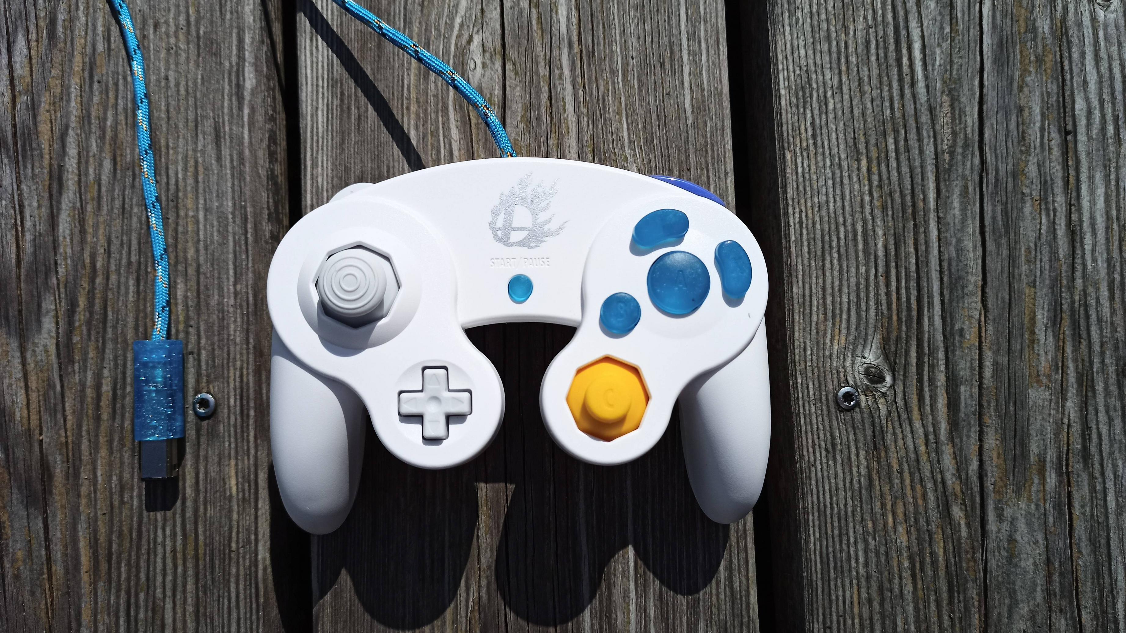 Custom Smash4 white with resin cast buttons and plug | Scrolller