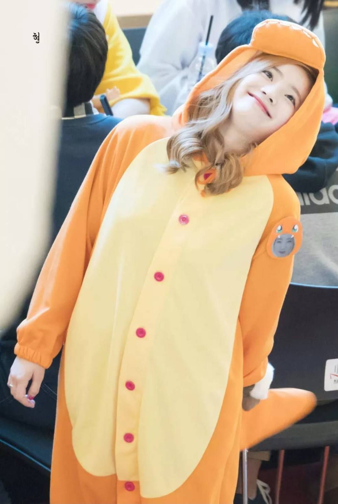 Dahyun - blonde, charmander costume | Scrolller