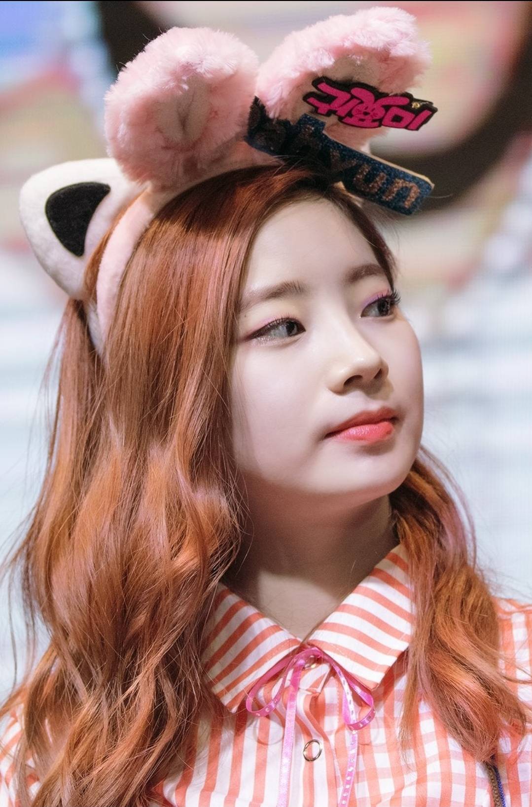Dahyun - red hair, pink bunny & cat ears, orange top | Scrolller