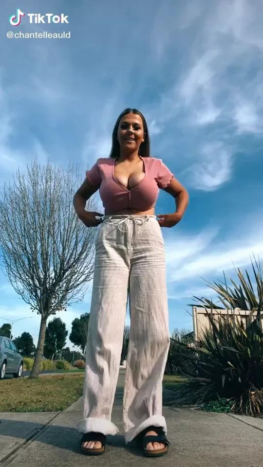 Damn, she is so hot! That little top looks so tight! | Scrolller