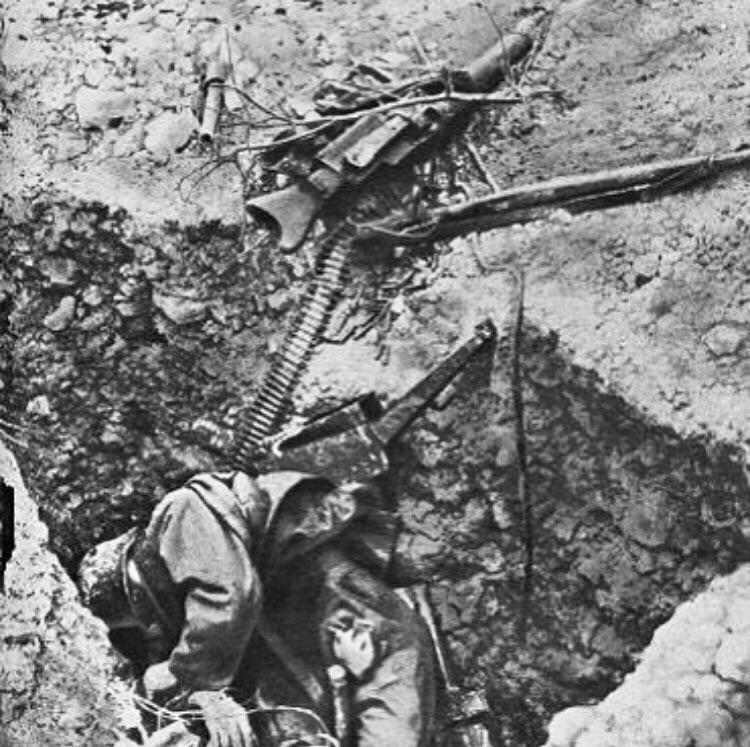 Dead German machine gunner on a trench, 1918. | Scrolller
