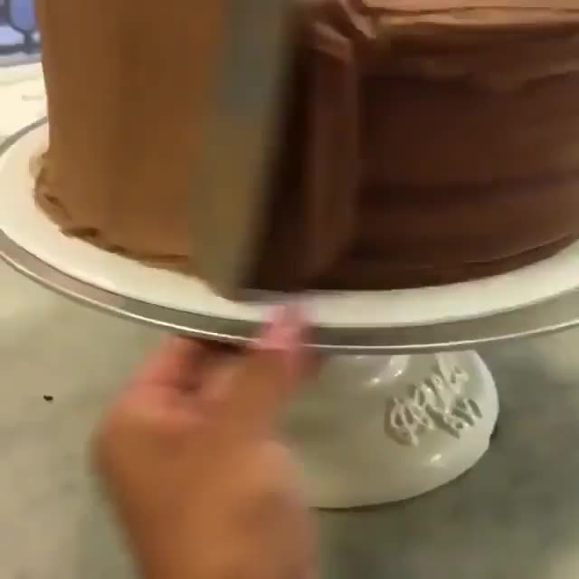Deftly frosting a cake | Scrolller