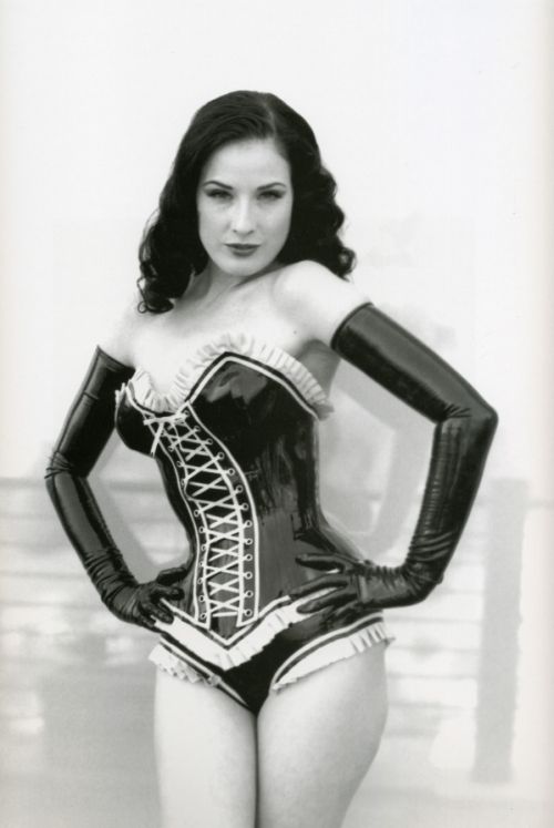 Dita Von Teese in latex corset and gloves | Scrolller