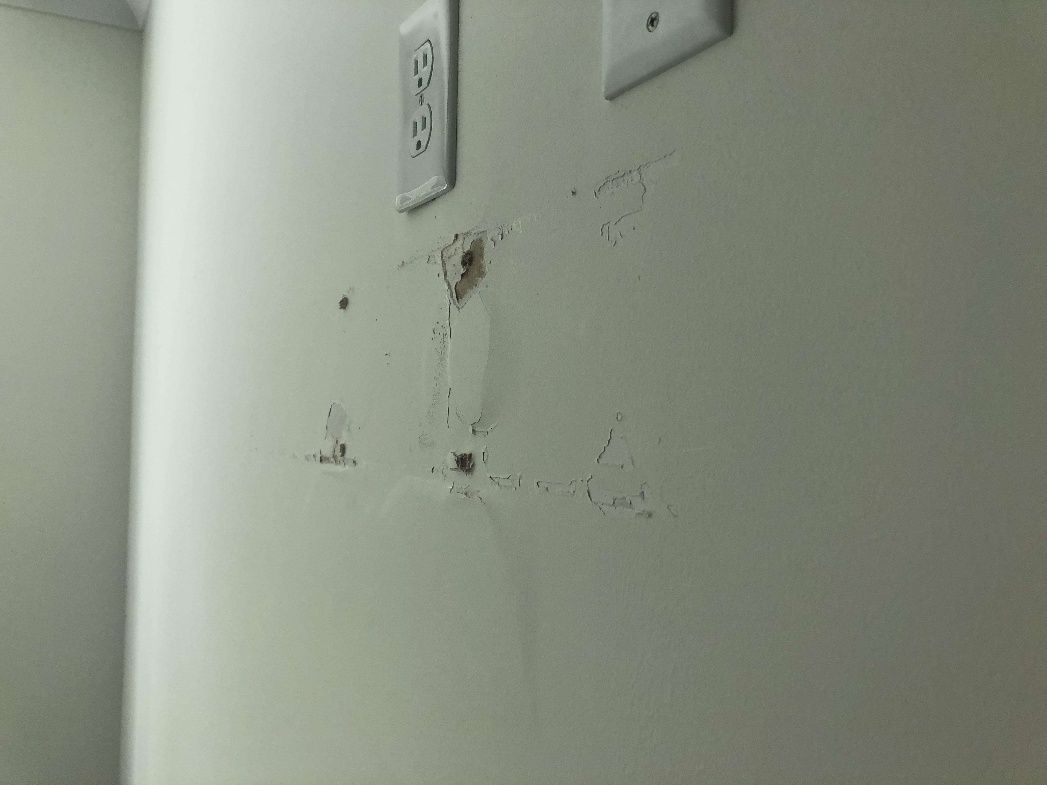 Drywall crushed by TV Mount - Topcoat or cut out and patch? | Scrolller