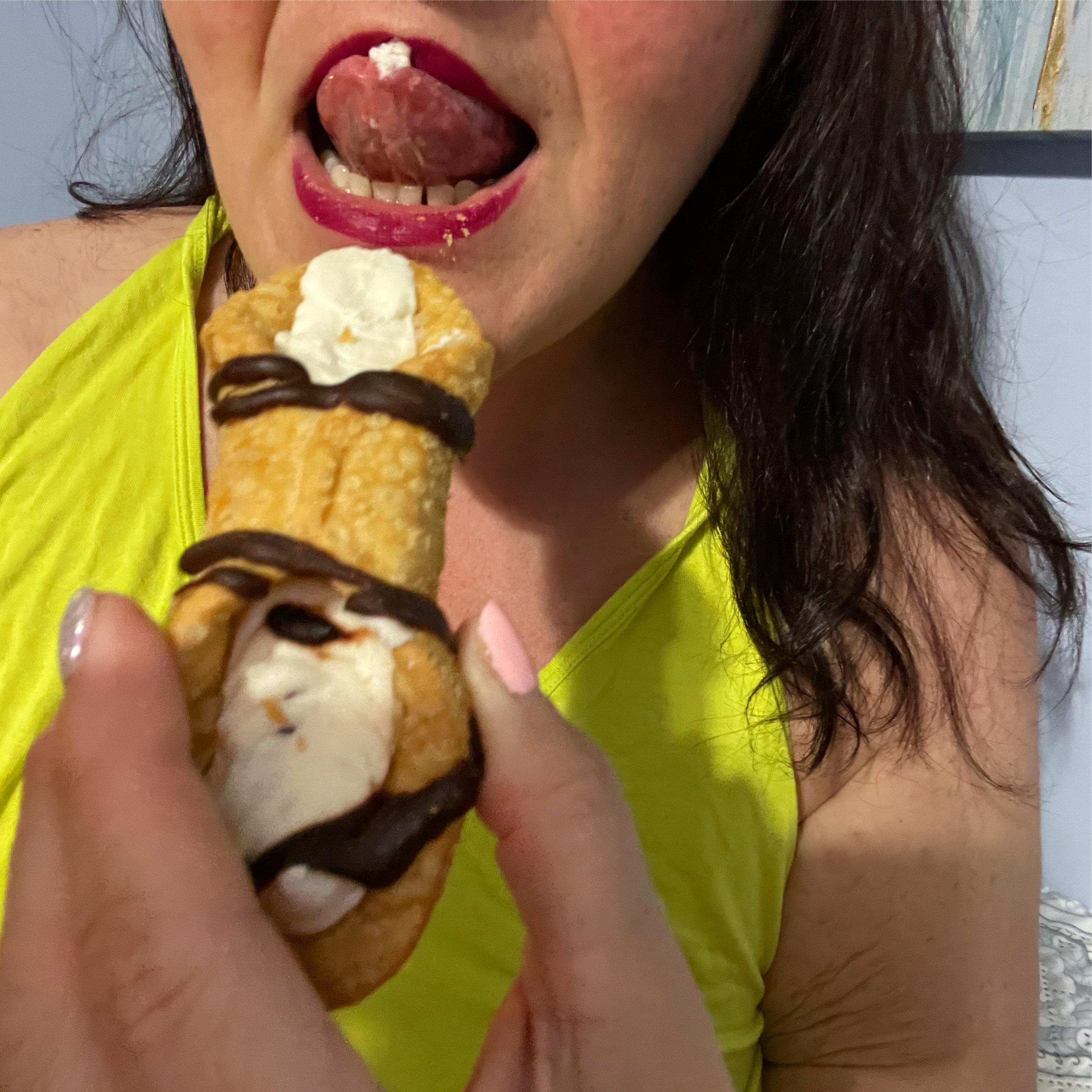 Eating a cannoli thinking about something else😈 | Scrolller