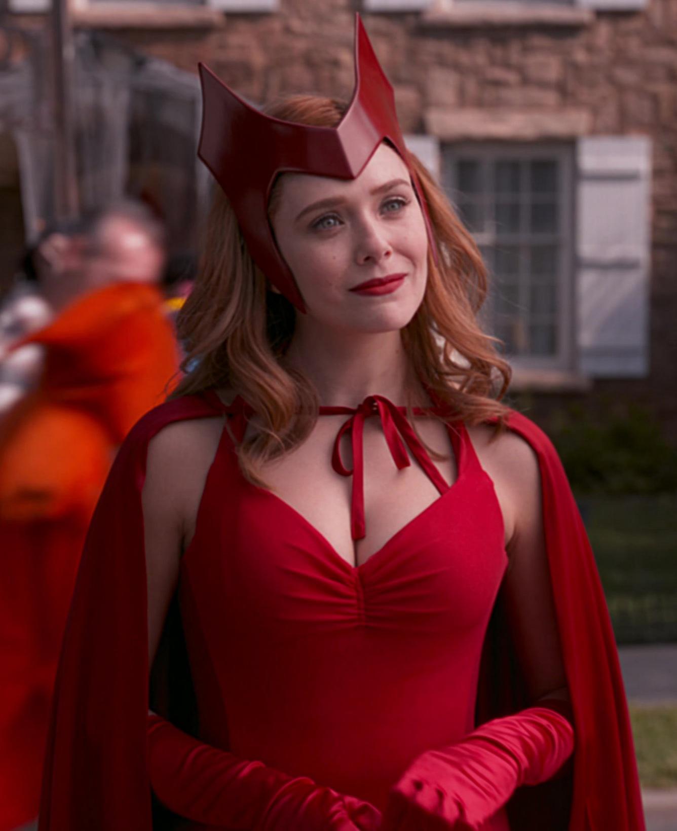 Elizabeth Olsen in her classic costume, using her magic to make us all cum | Scrolller