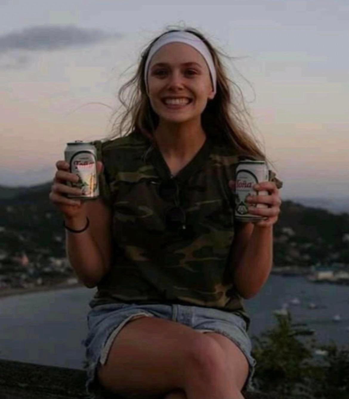 Elizabeth Olsen wearing camo and daisy dukes gets my country cock rock ...