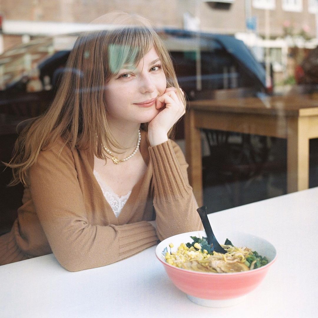 Ella at a restaurant | Scrolller