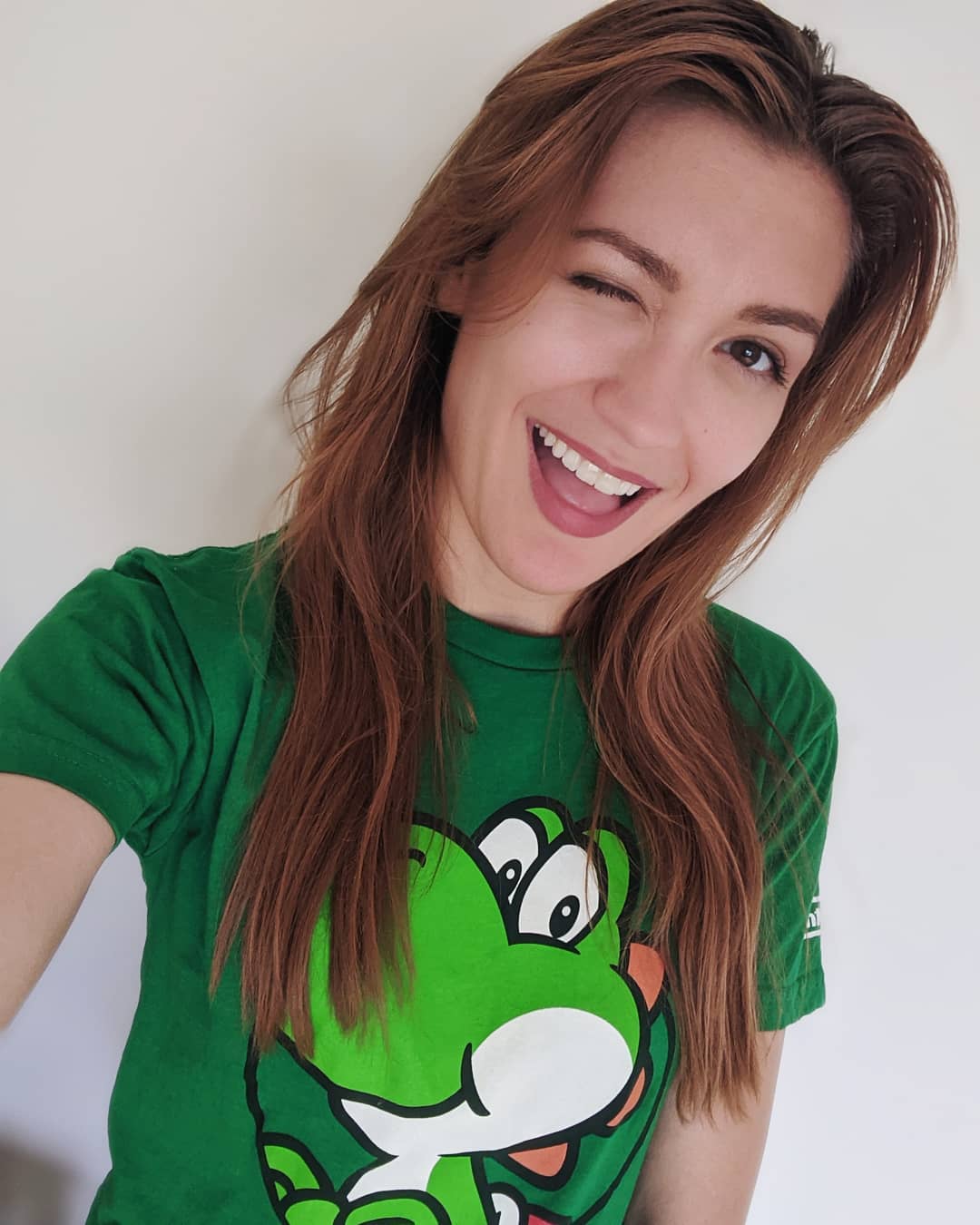 Erin with Yoshi | Scrolller