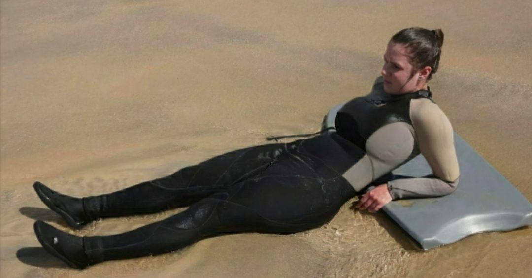 Even a wet suit can't hide her massive jugs | Scrolller