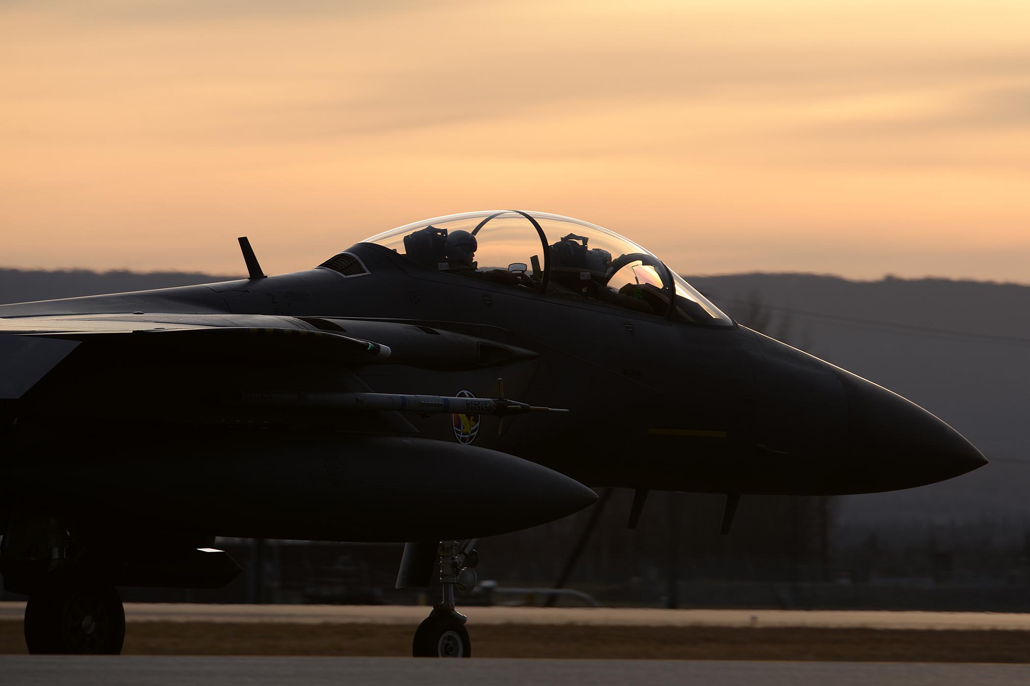 F-15K Slam Eagle taxis down the Eielson Air Force Base, Alaska, flight line during Red Flag ...