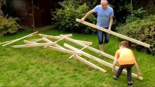 Father and son build a backyard bridge | Scrolller