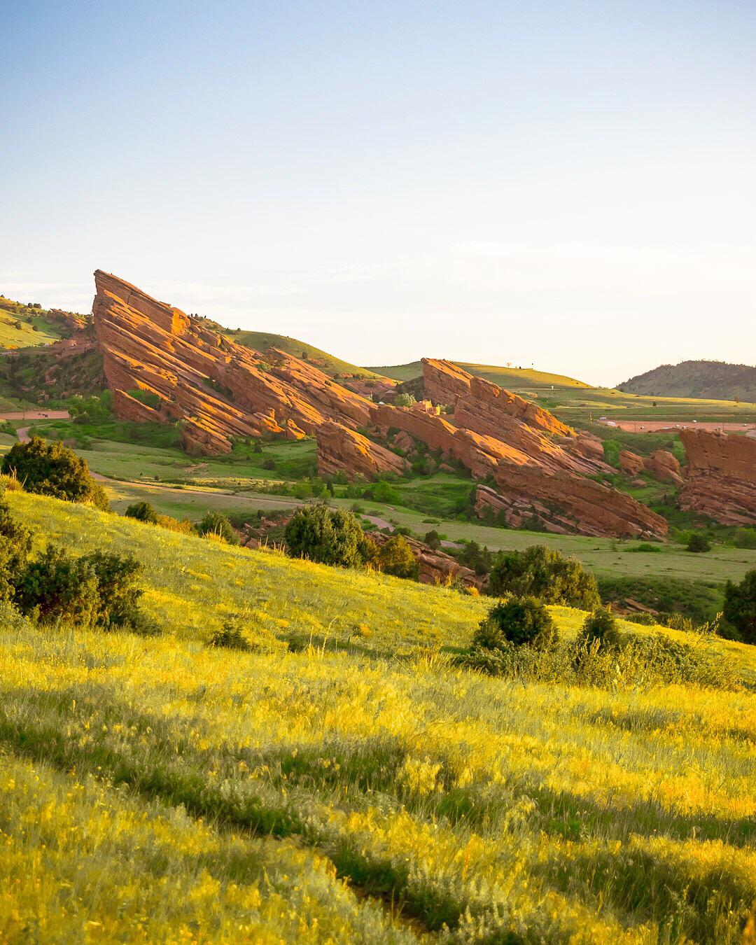 First light hitting Red Rocks, shot from Mount Falcon | Scrolller