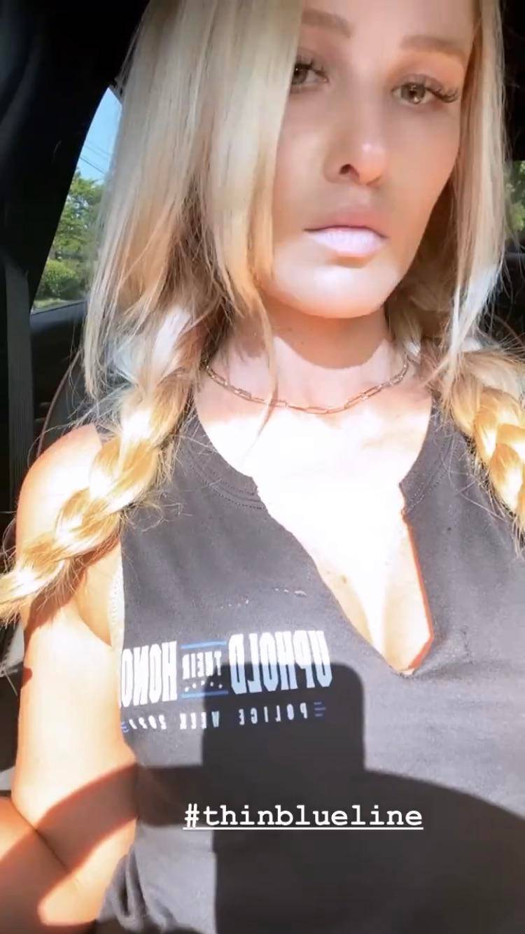 Flashing her cleavage in a deep v cut | Scrolller