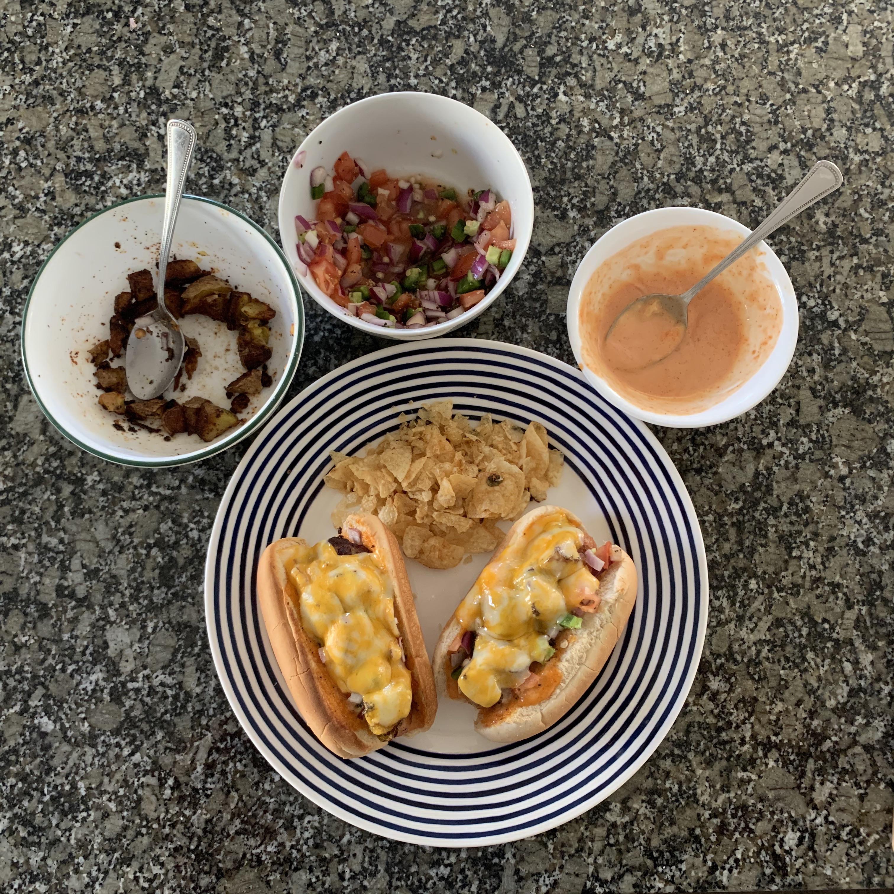 +Fried potatoes with Mexican seasoning, pico de Gallo, sriracha aioli, and melted Colby jack ...