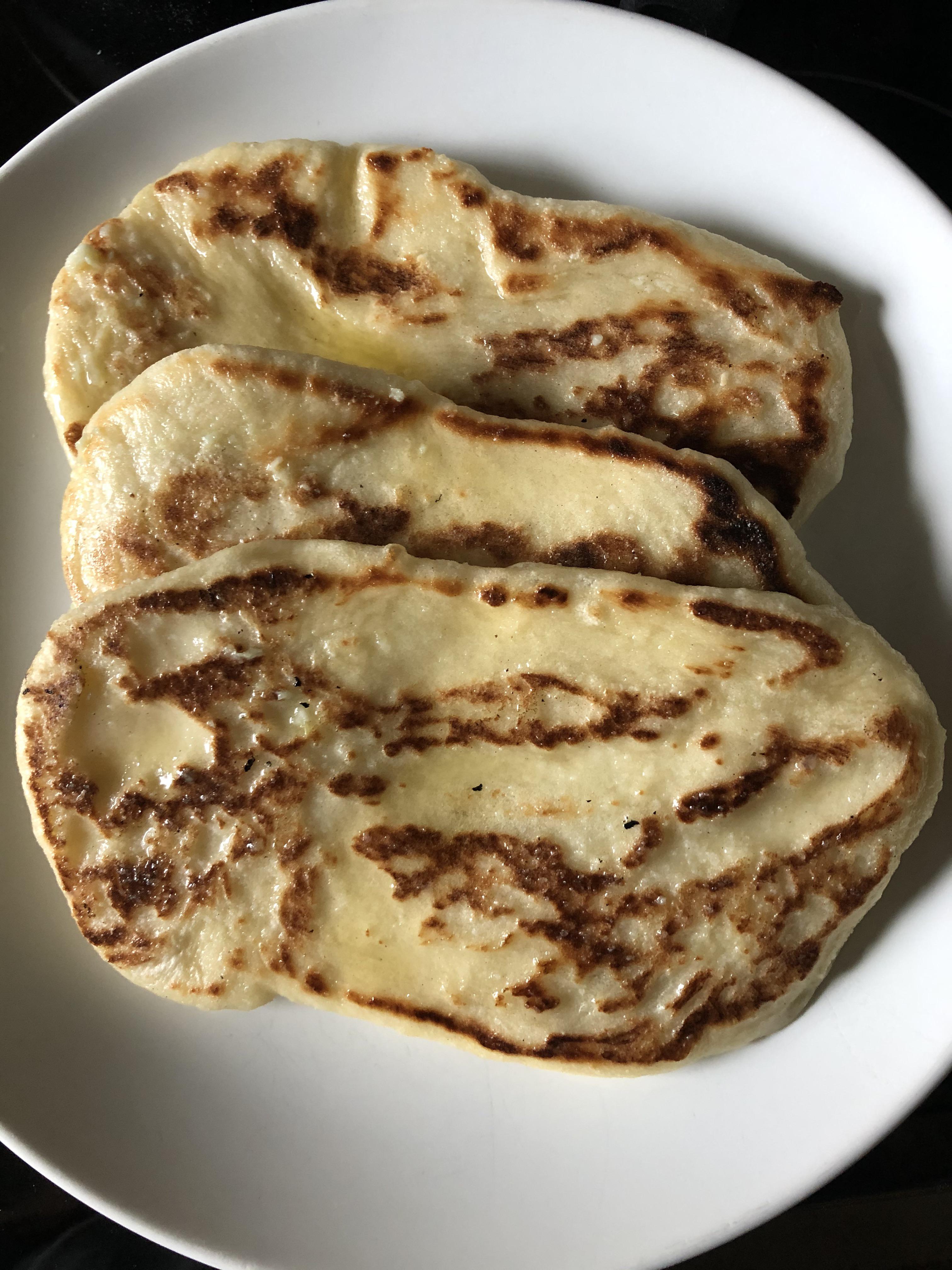 Garlic naan using a cast iron pan | Scrolller