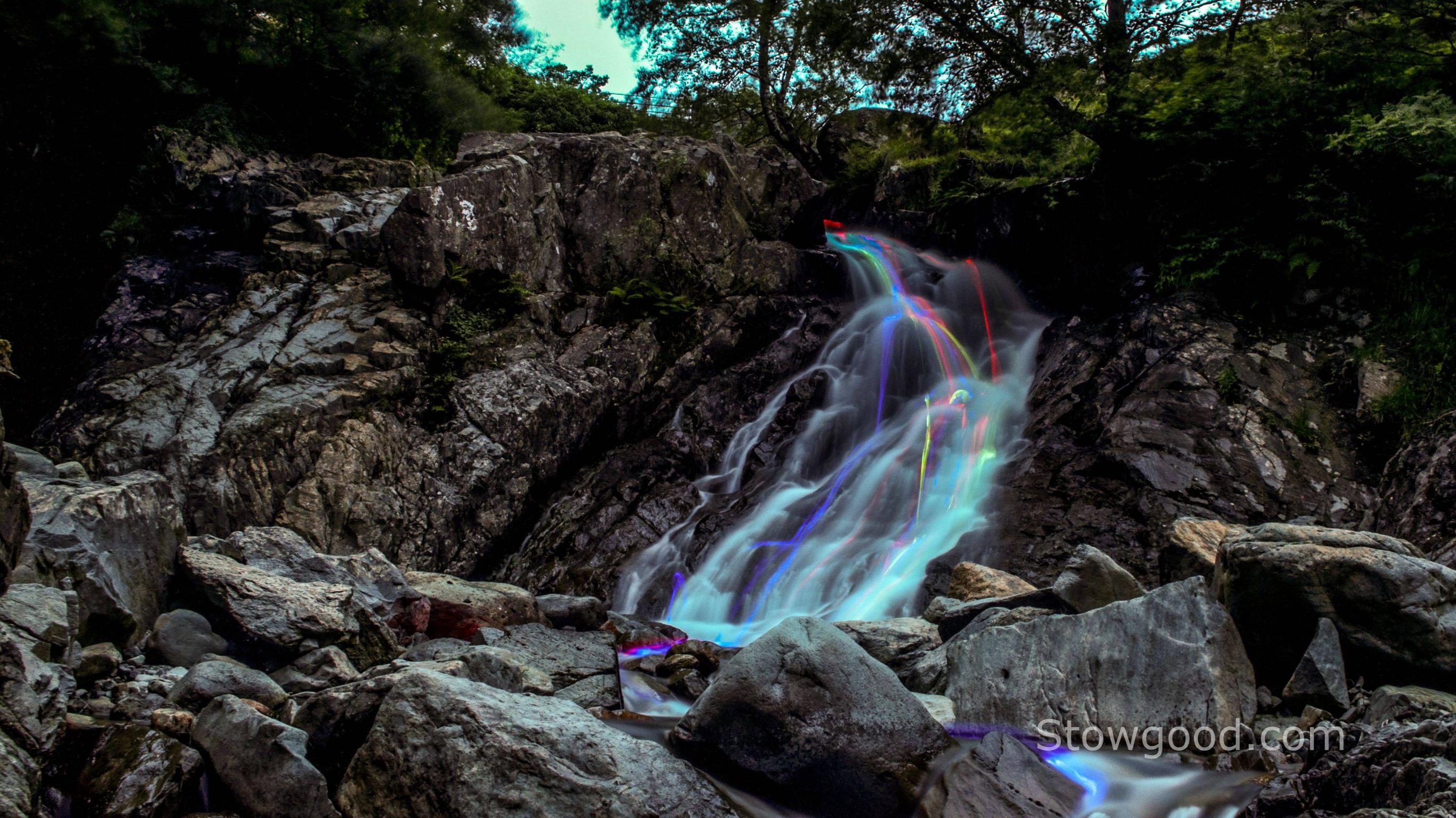 Glowsticks in a waterfall. | Scrolller