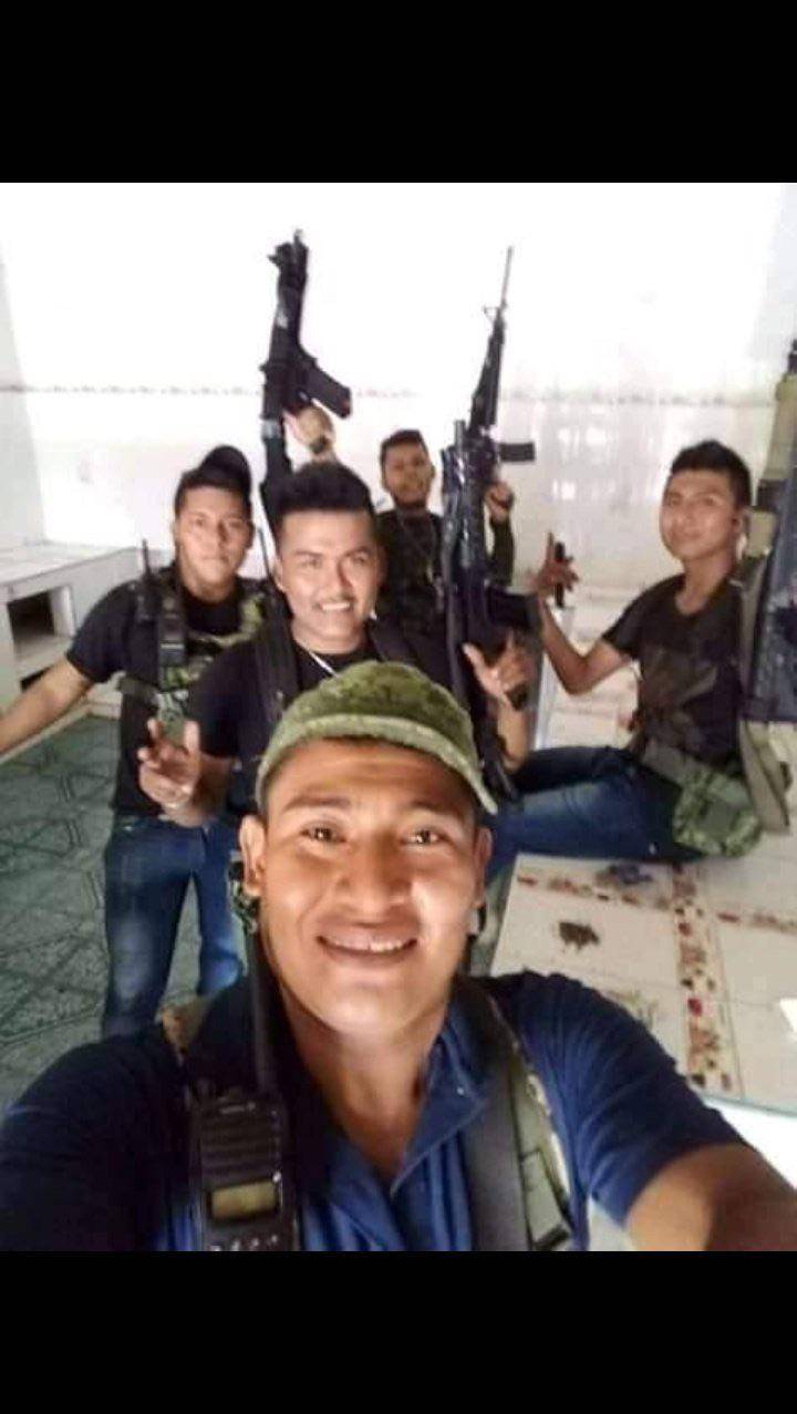 Group selfie of a Familia Michoacana cell coming soon to a neighborhood near you | Scrolller