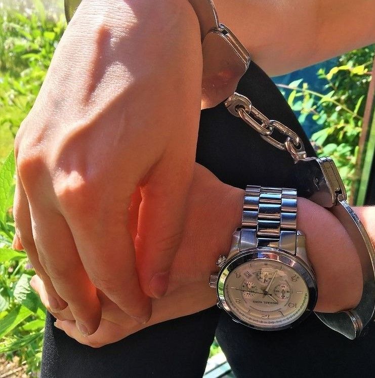 Handcuffed and Waiting | Scrolller