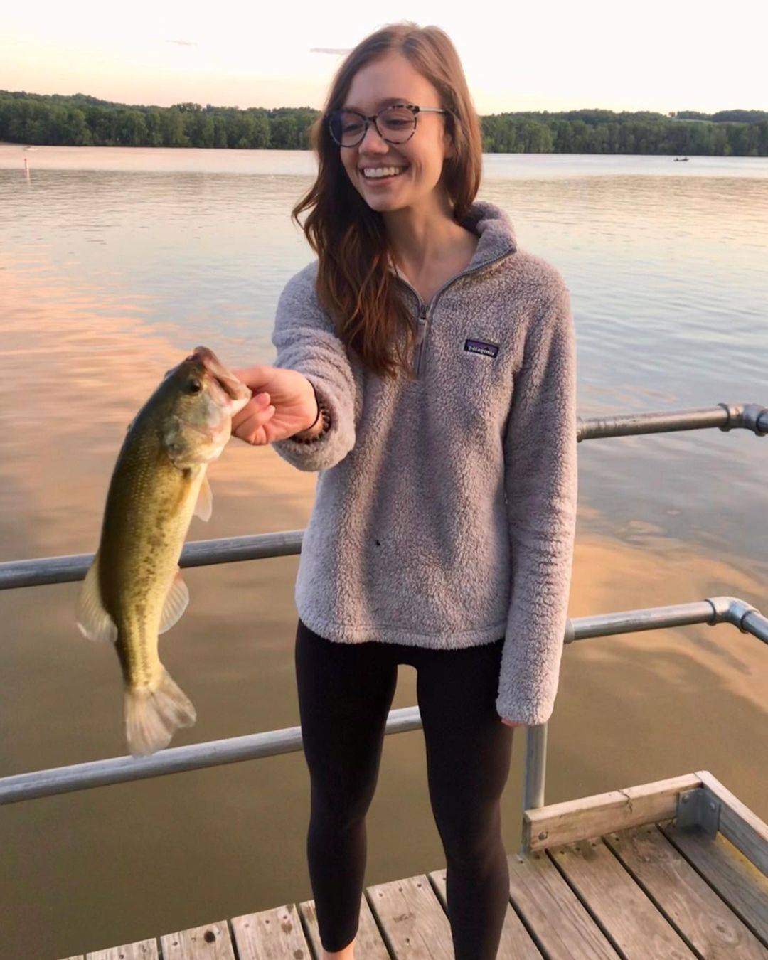 Happy with Her Catch | Scrolller