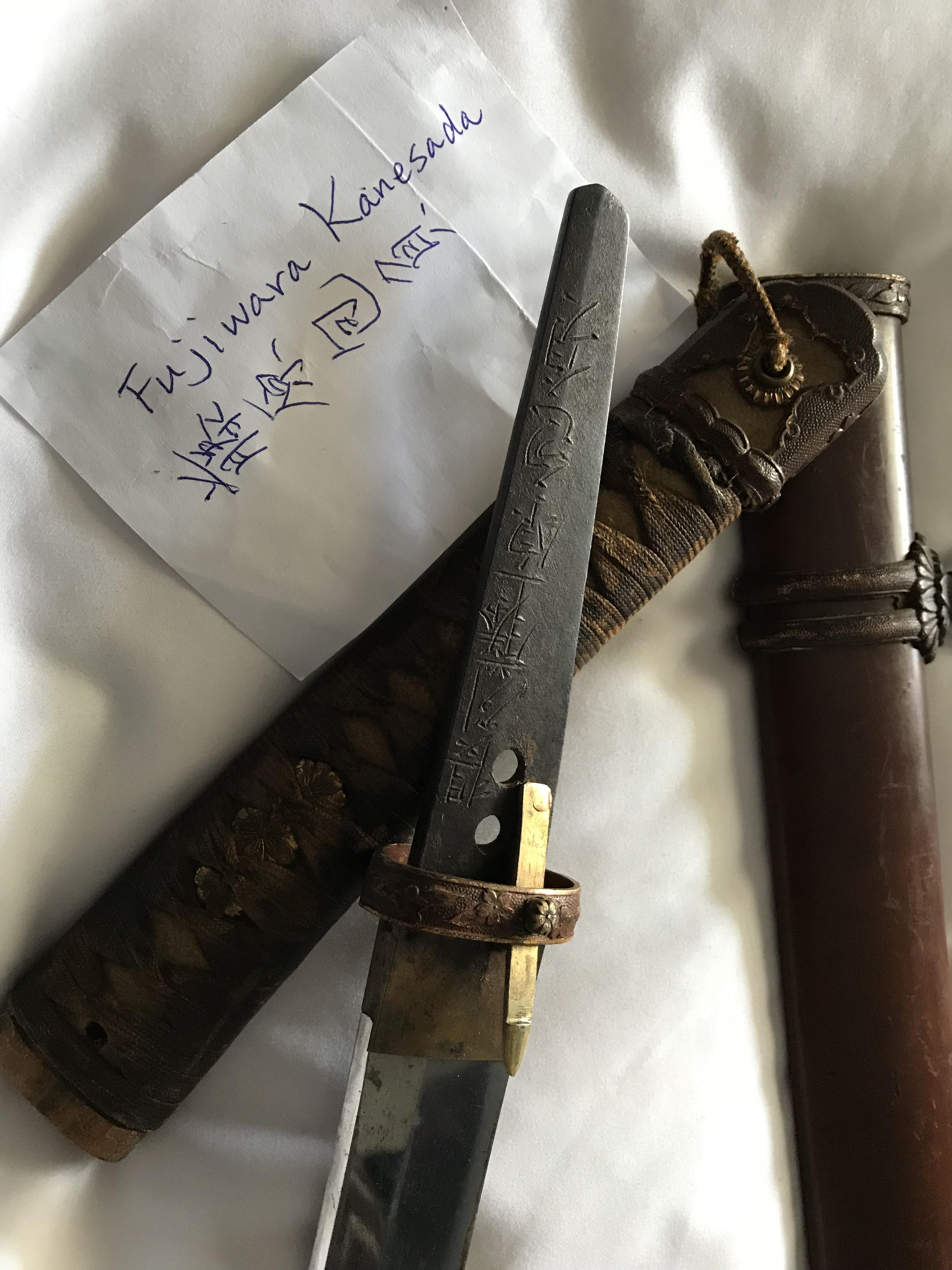 Help me identify this katana- thanks | Scrolller