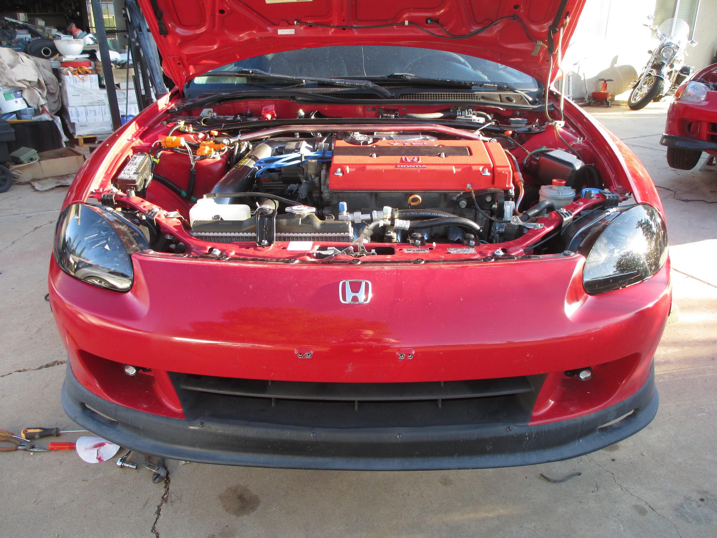 Here's the new one! 1997 VTEC in Milano red. Just finished swapping parts between them to make ...