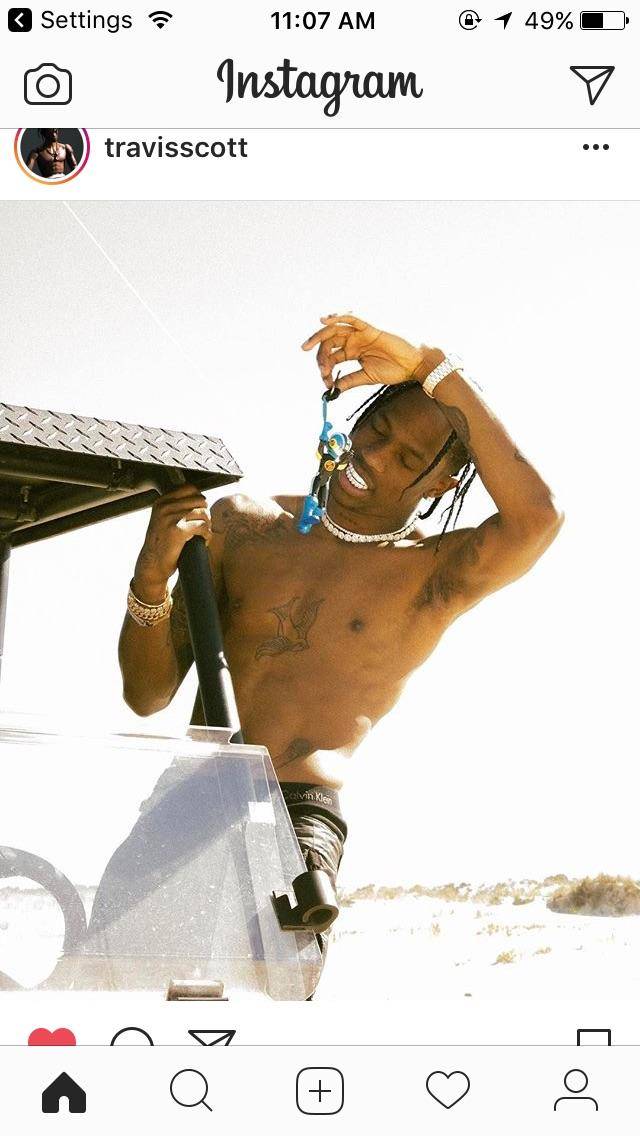 Hip-Hop Star Travis Scott holding Megaman.EXE | Scrolller