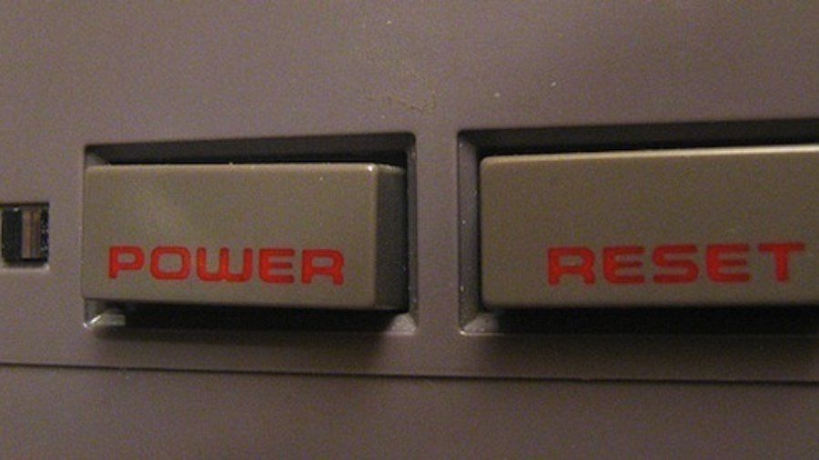 Holding down the Reset button before powering down to try and save your game on the original ...