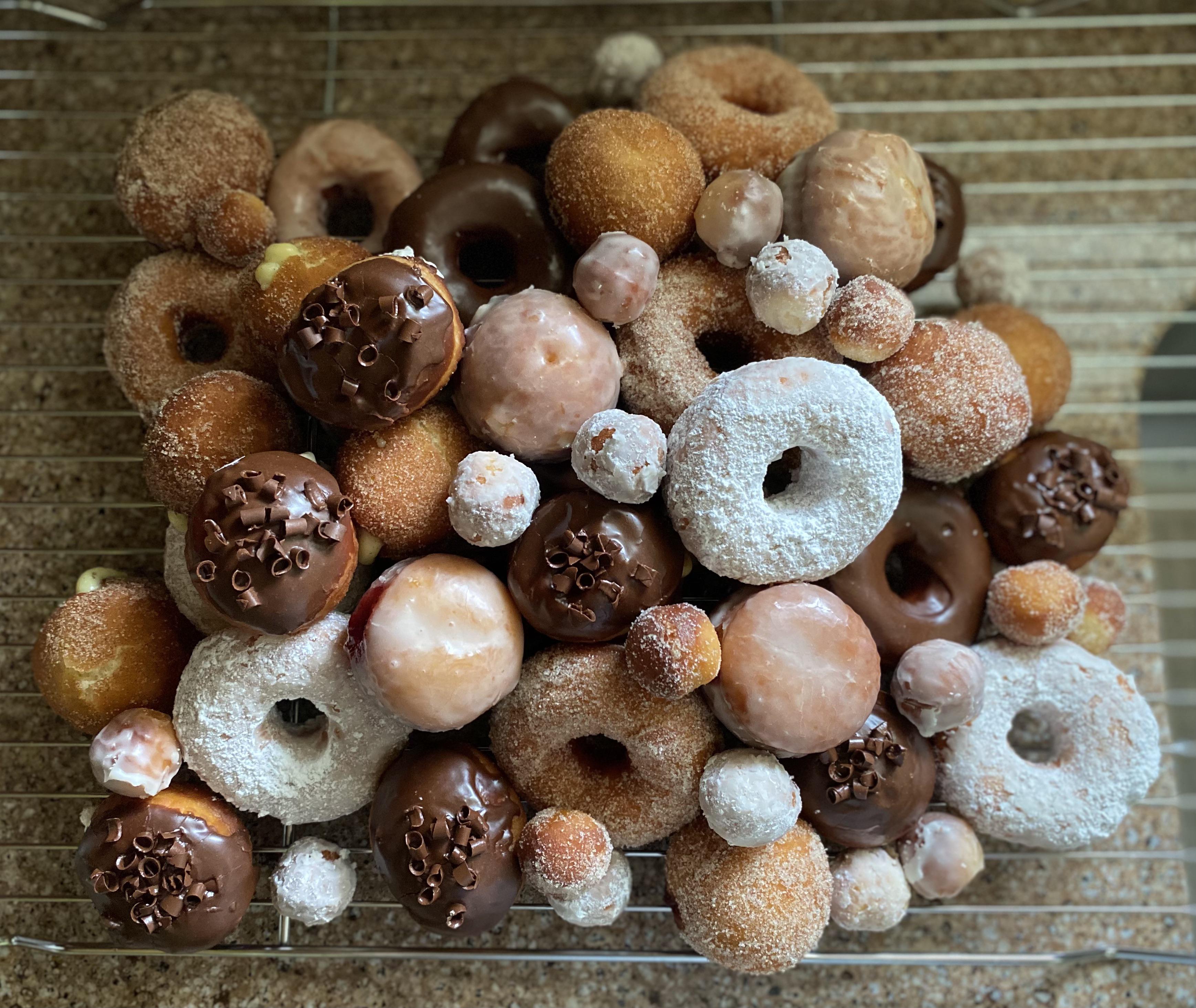 Homemade donuts - glazed, chocolate glazed, cinnamon sugar, Boston Cream, raspberry jam, and ...