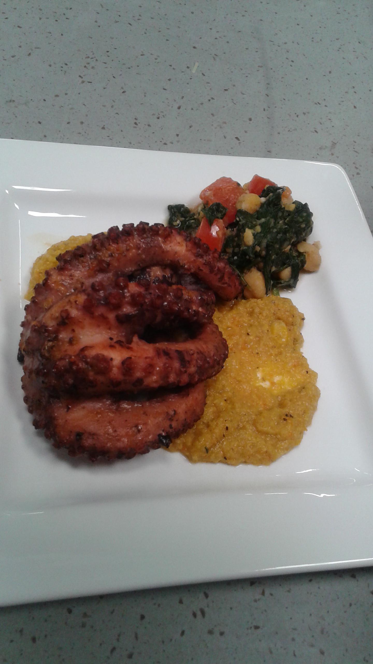 [Homemade] Grilled octopus with roasted corn sauce. Side of chickpeas, spinach, and tomatoes ...