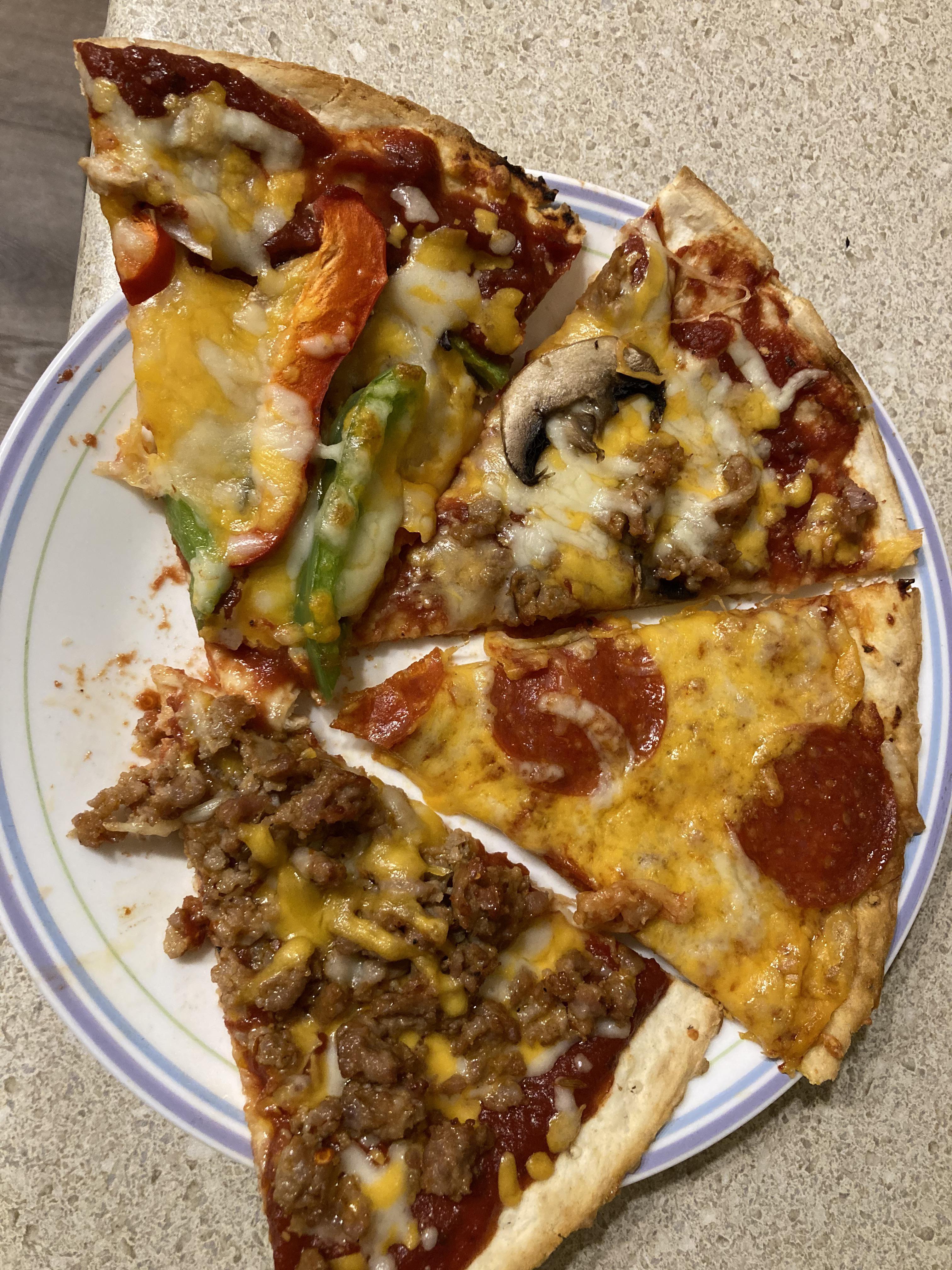 Homemade pizza tonight! When there is seven of us, variety is the icing on the cake! | Scrolller