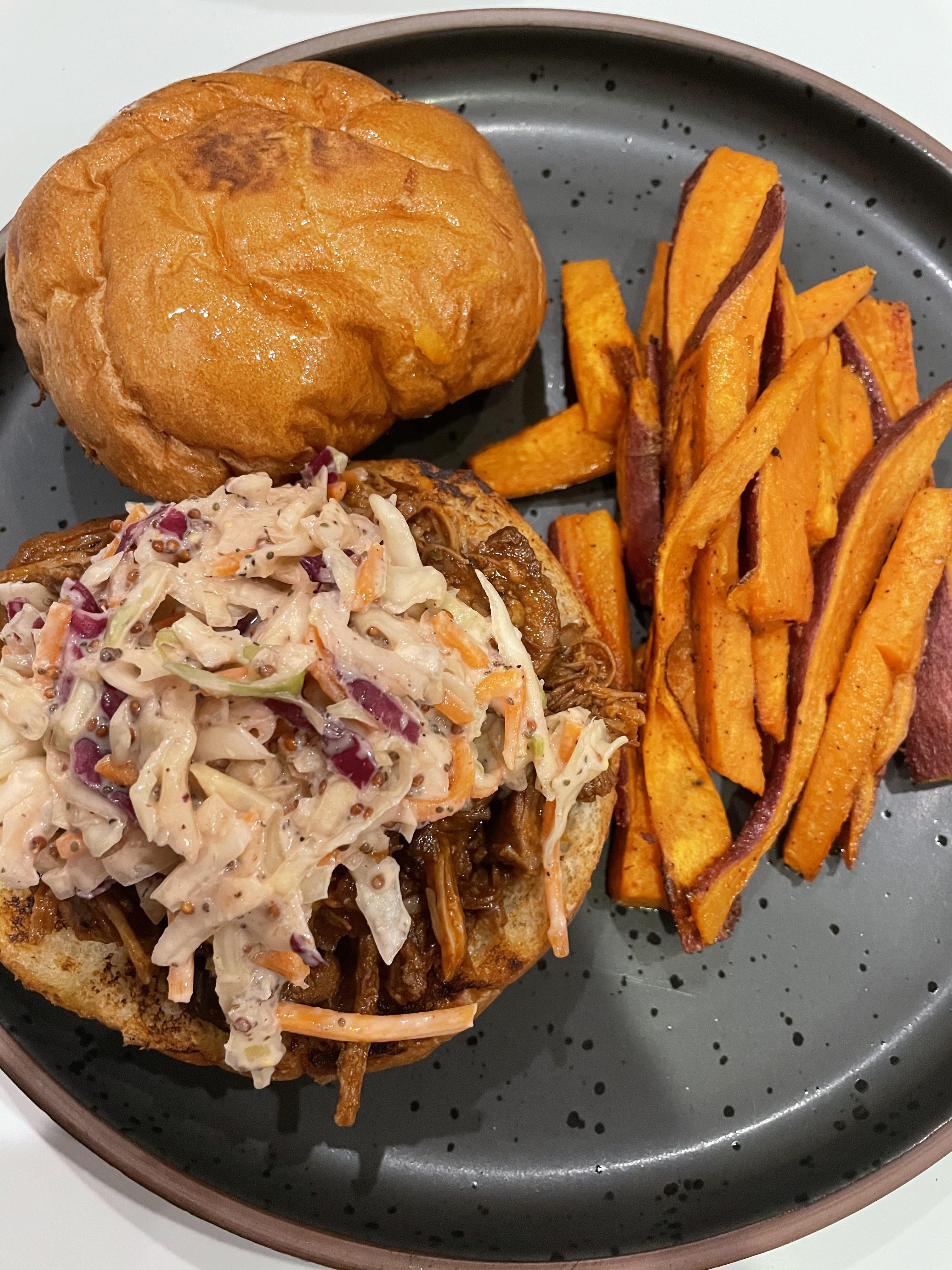 Homemade pulled pork sandwich with sweet potato fries | Scrolller