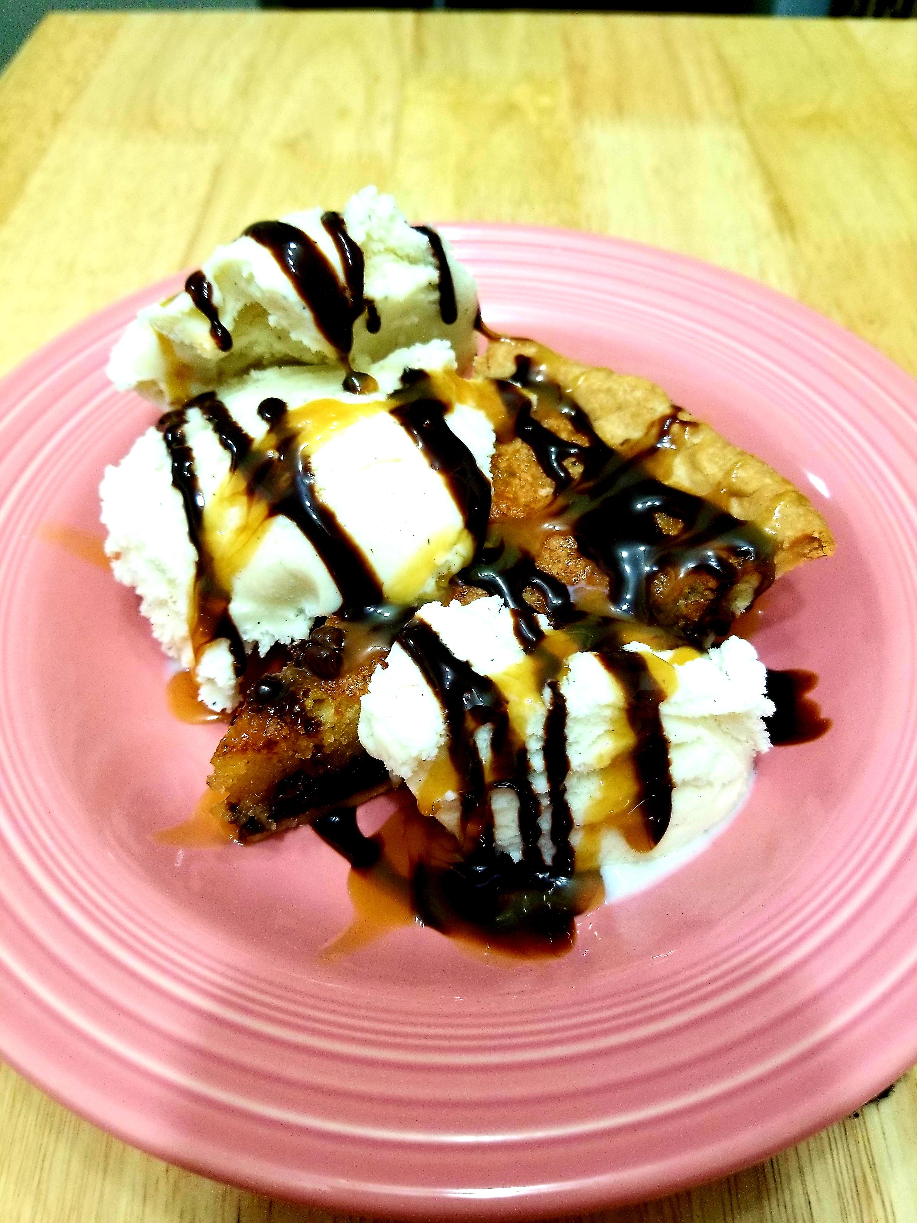 Homemade Toll House Pie with Frozen Vanilla Bean Yogurt topped with Caramel and Chocolate ...