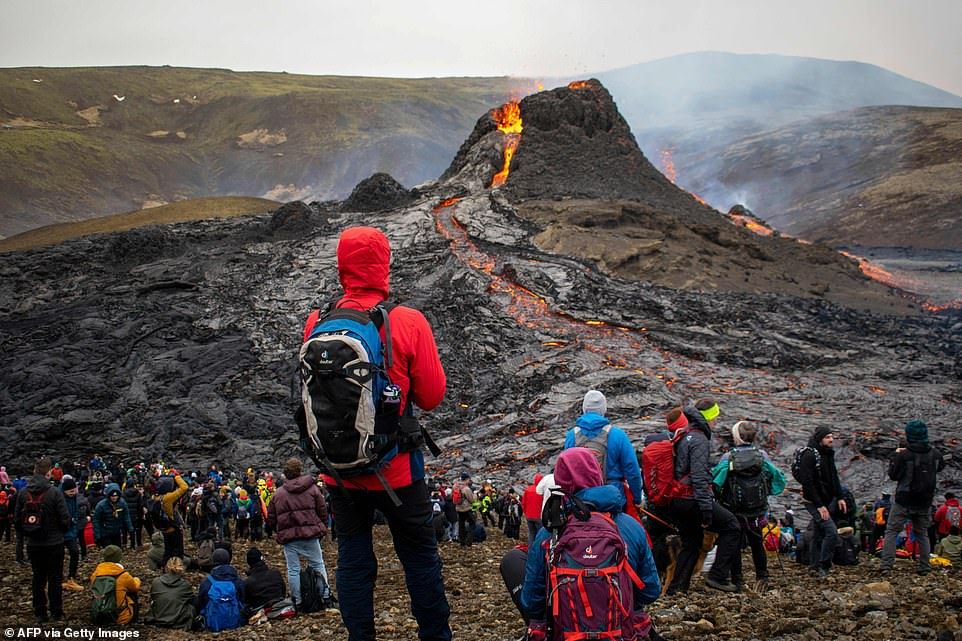 Icelanders visiting the erupting volcano yesterday | Scrolller