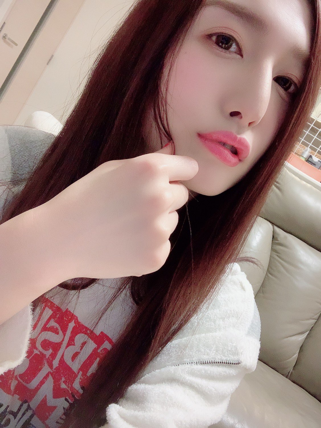 Iori Kogawa pinching her cheeks | Scrolller