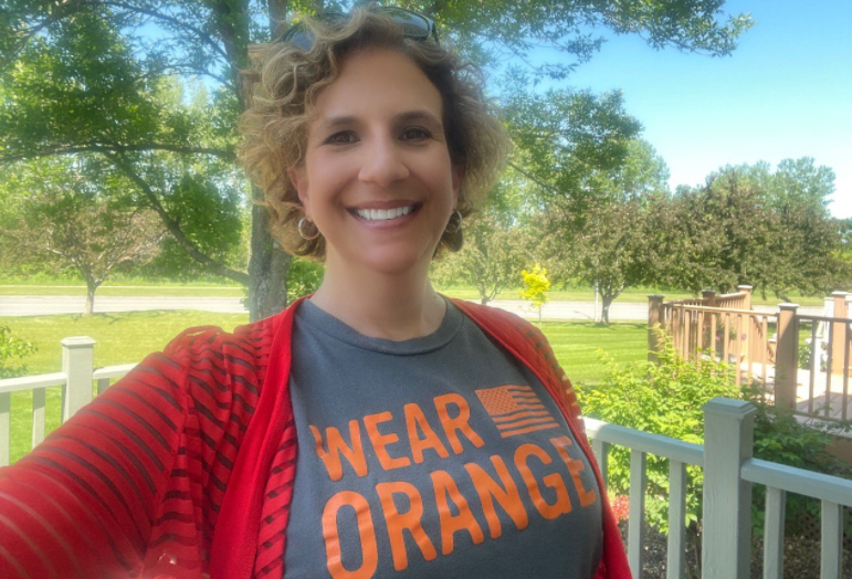 Iowa state senator Claire Celsi wears orange to draw attention to her massive milkers | Scrolller