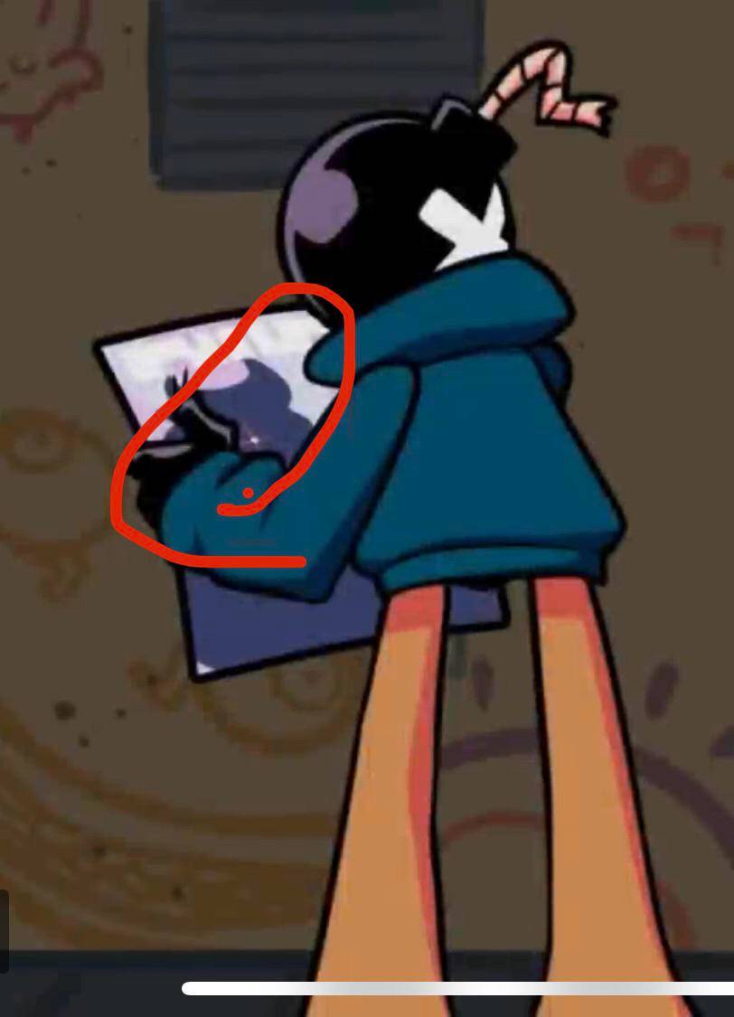 It looks like whitty is hold a poster of daddy dearest for some reason, also if it confuses you ...