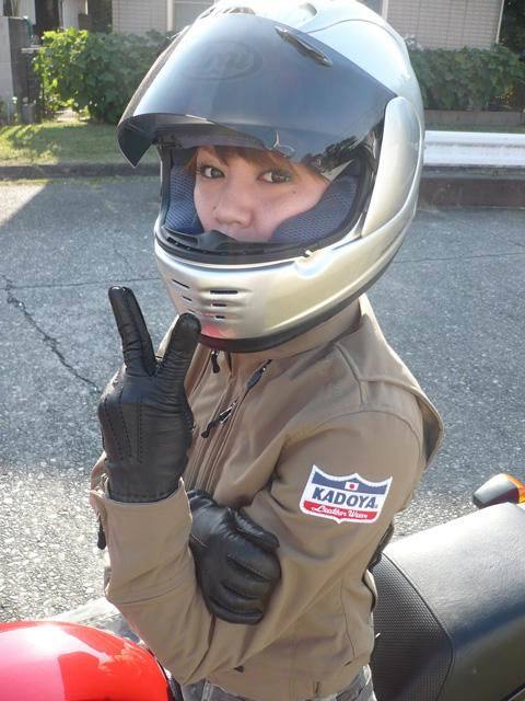 Japanese biker girl giving the deuces | Scrolller