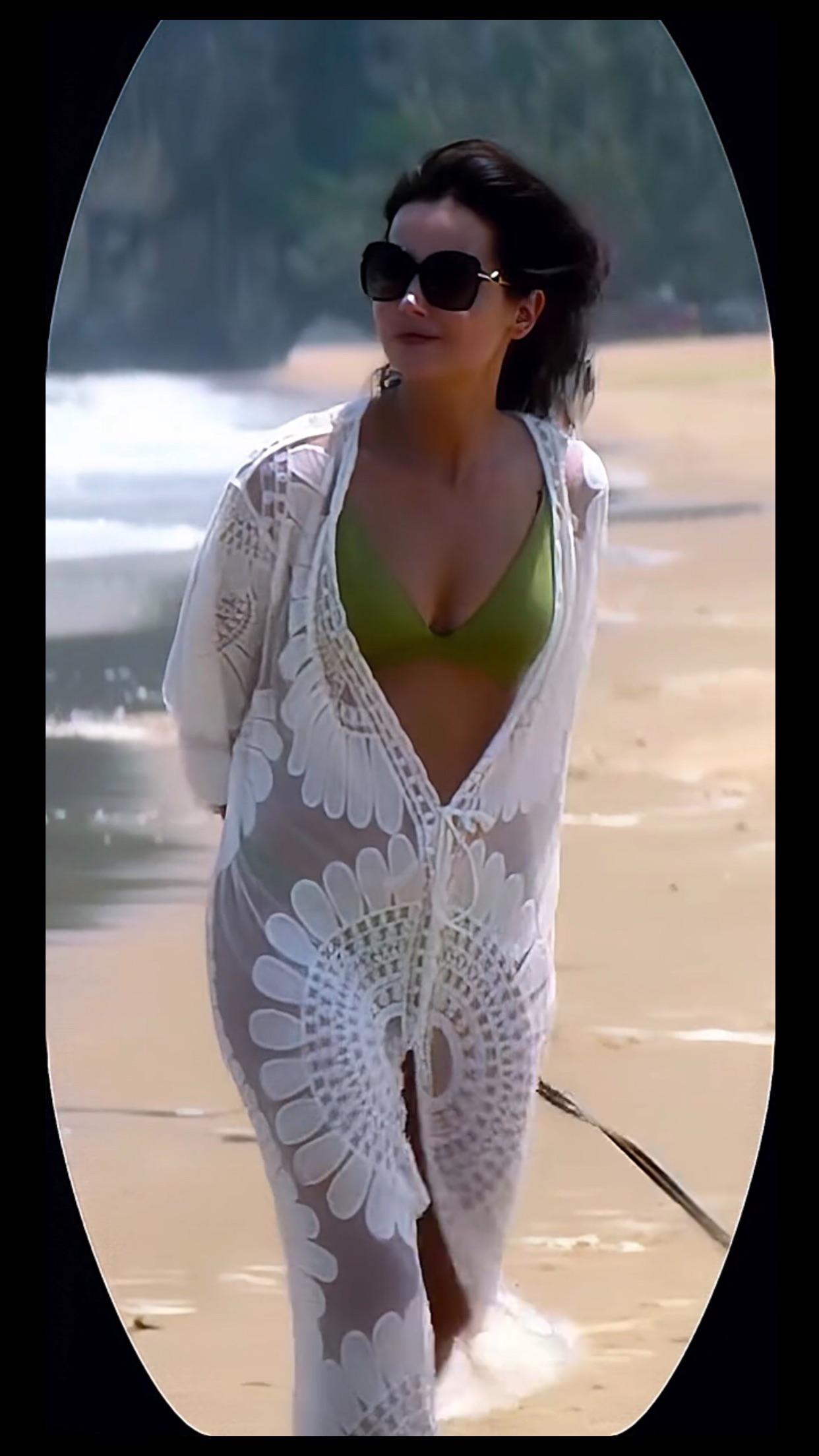 Jenna Coleman In A Bikini Scrolller