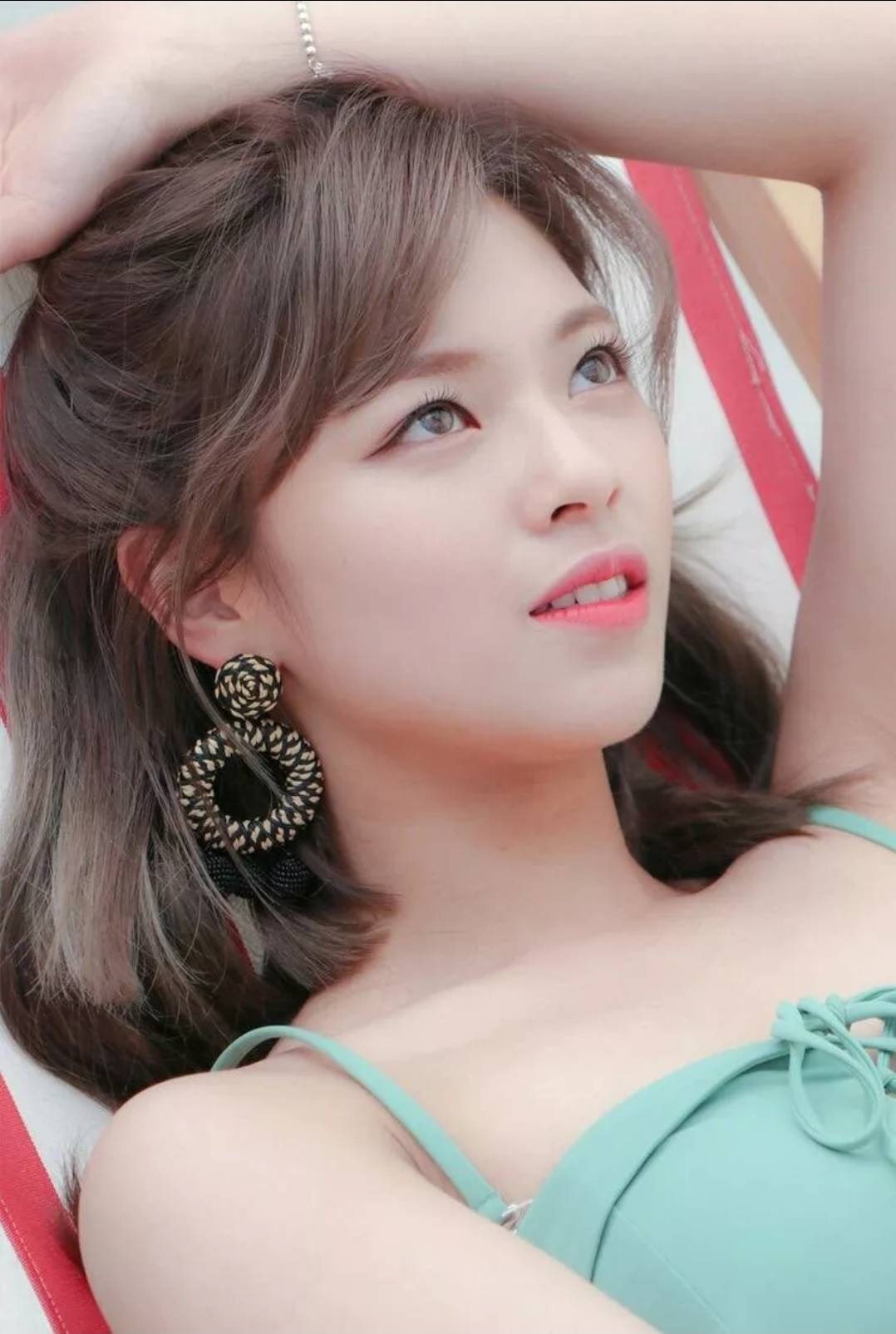 Jeongyeon - light eyes, teal green top | Scrolller