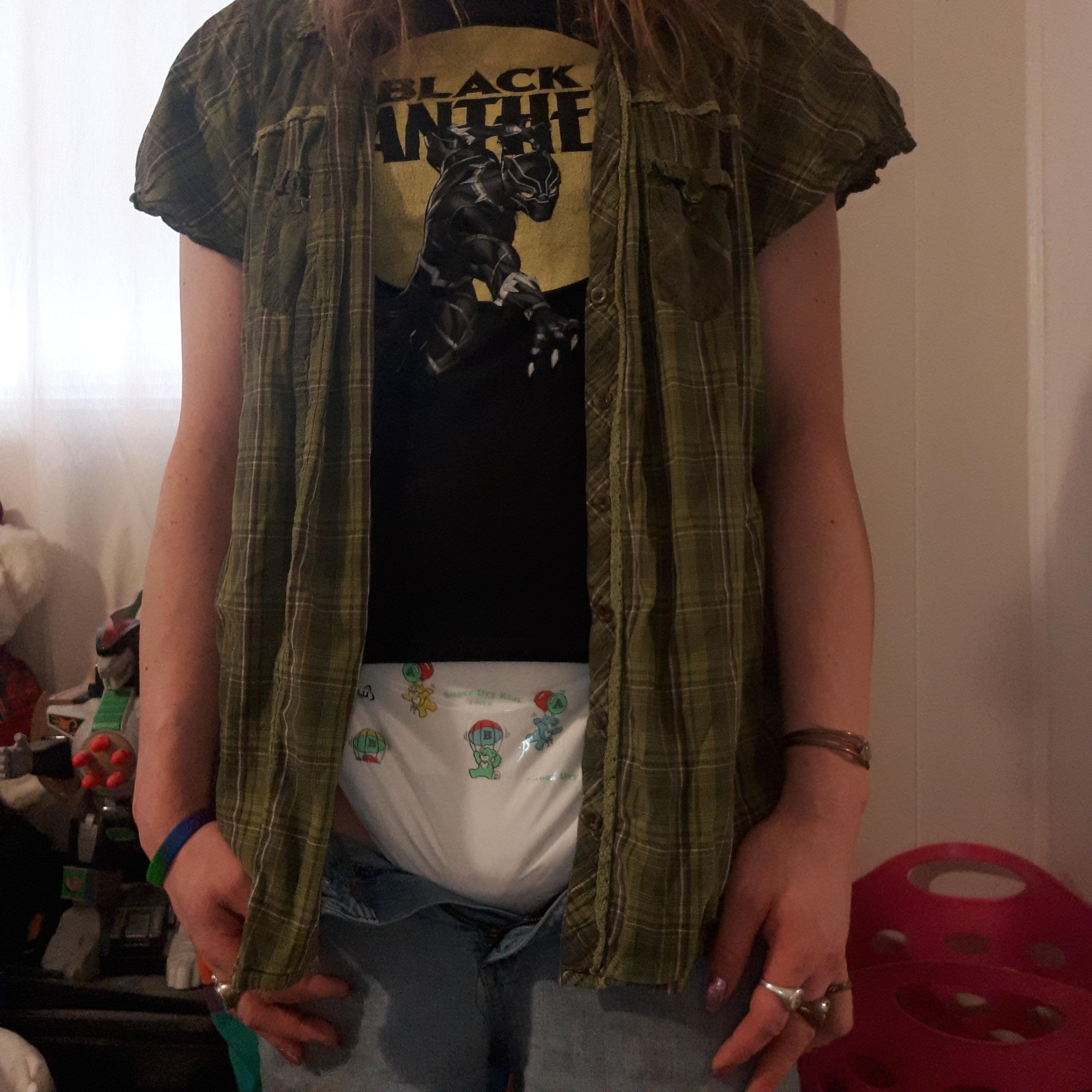 Just a nerdy girl in a super hero tee and crinkly diaper. | Scrolller