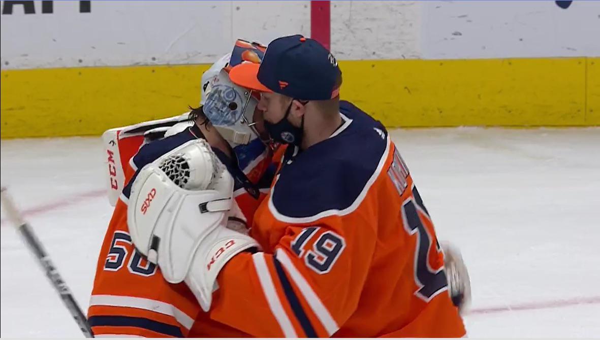Koskinen Hugging Skinner after his first NHL win | Scrolller