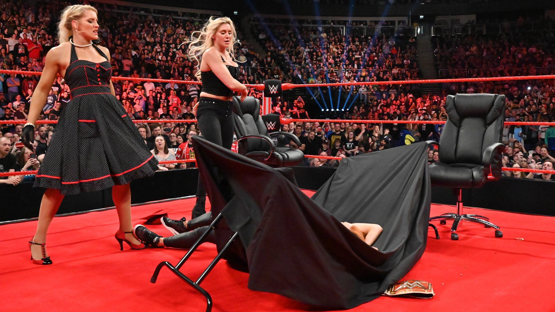 Lacey & Charlotte putting Becky Lynch through a table | Scrolller