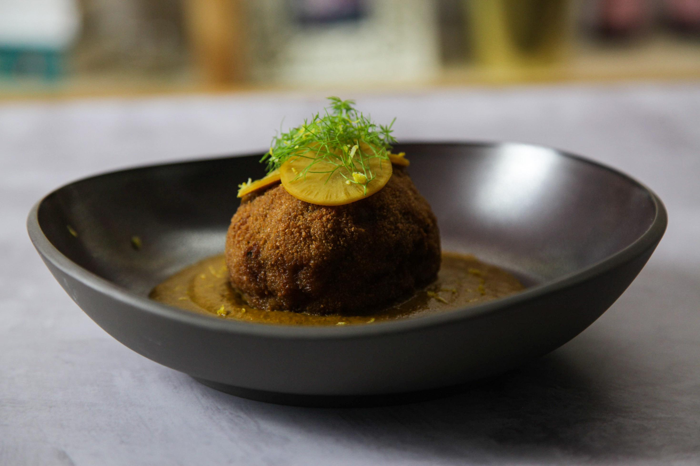 Lamb scotch egg, curry, pickled radish | Scrolller