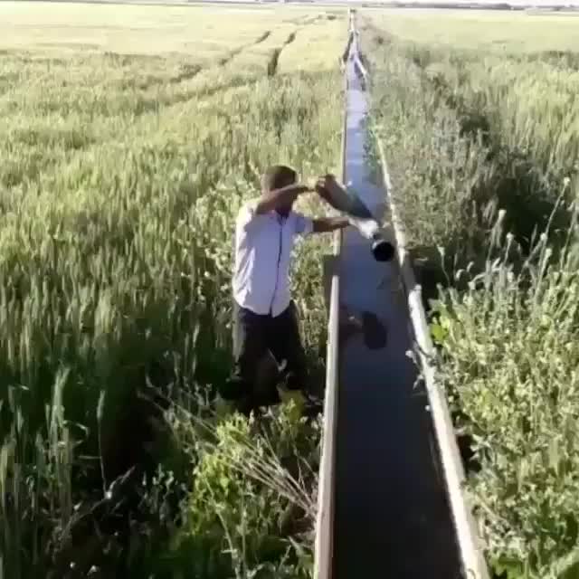 Large-diameter siphon for irrigation. Started via kinematics/inertia. | Scrolller