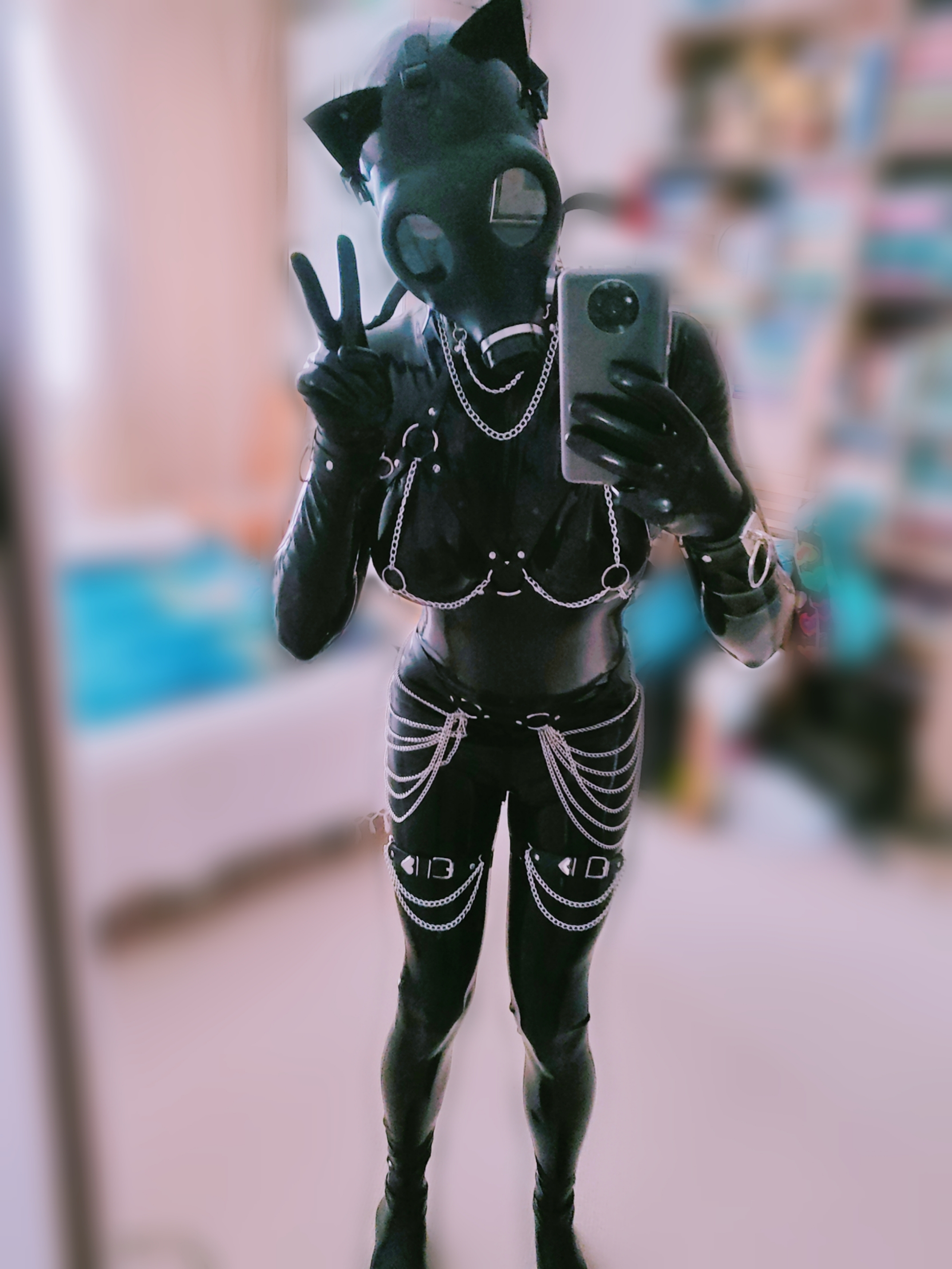 Latex and chains | Scrolller