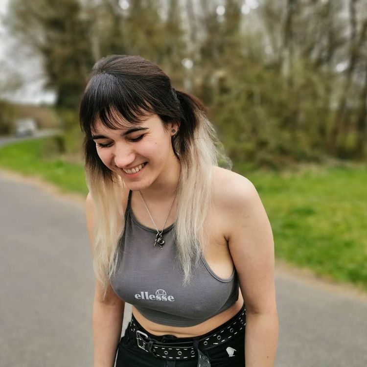 Laughing at how her top can't hide them | Scrolller